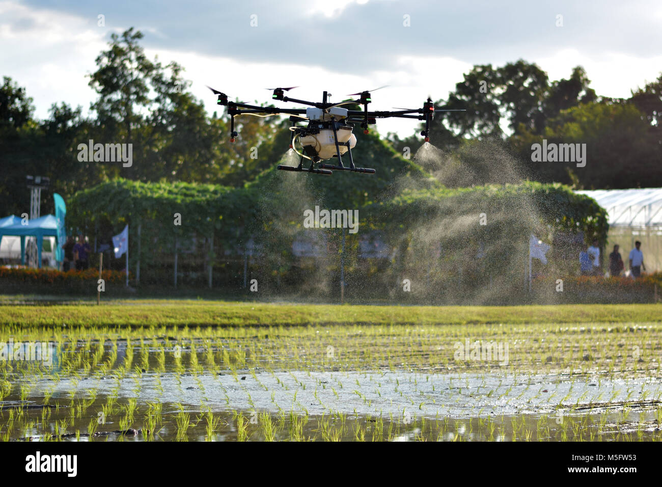 Carrying agriculture drone, photo image of agriculture drone carry a ...