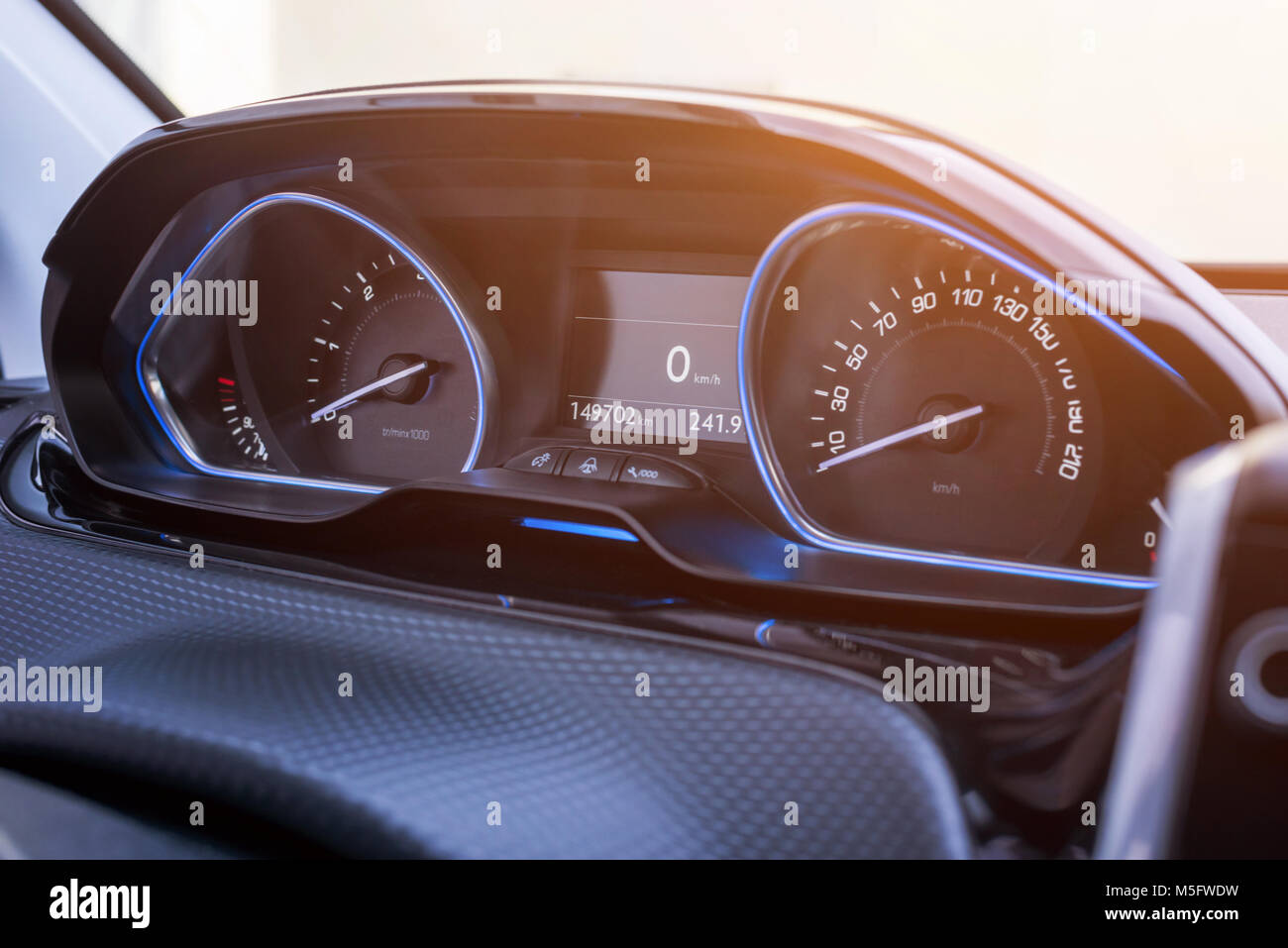 Car speedometer close up. Modern car interior with blue led light Stock ...
