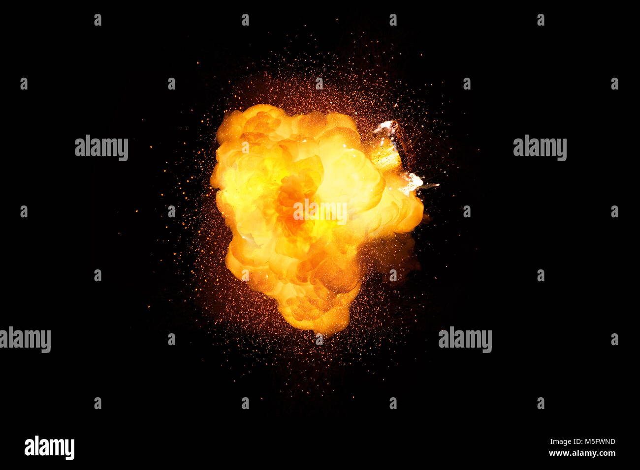 Realistic fiery explosion with sparks and smoke isolated on black ...