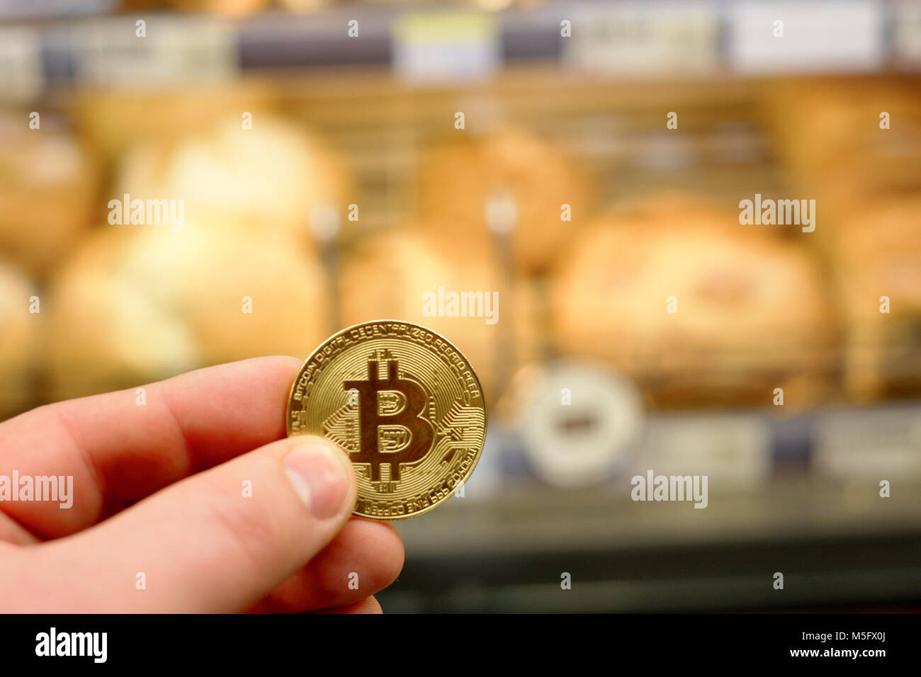 Bitcoin payment for food, fruit and vegetable in a grocery store using ...