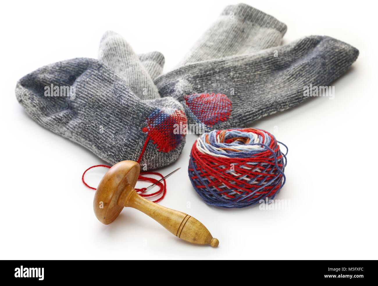 Darning socks hi-res stock photography and images - Alamy