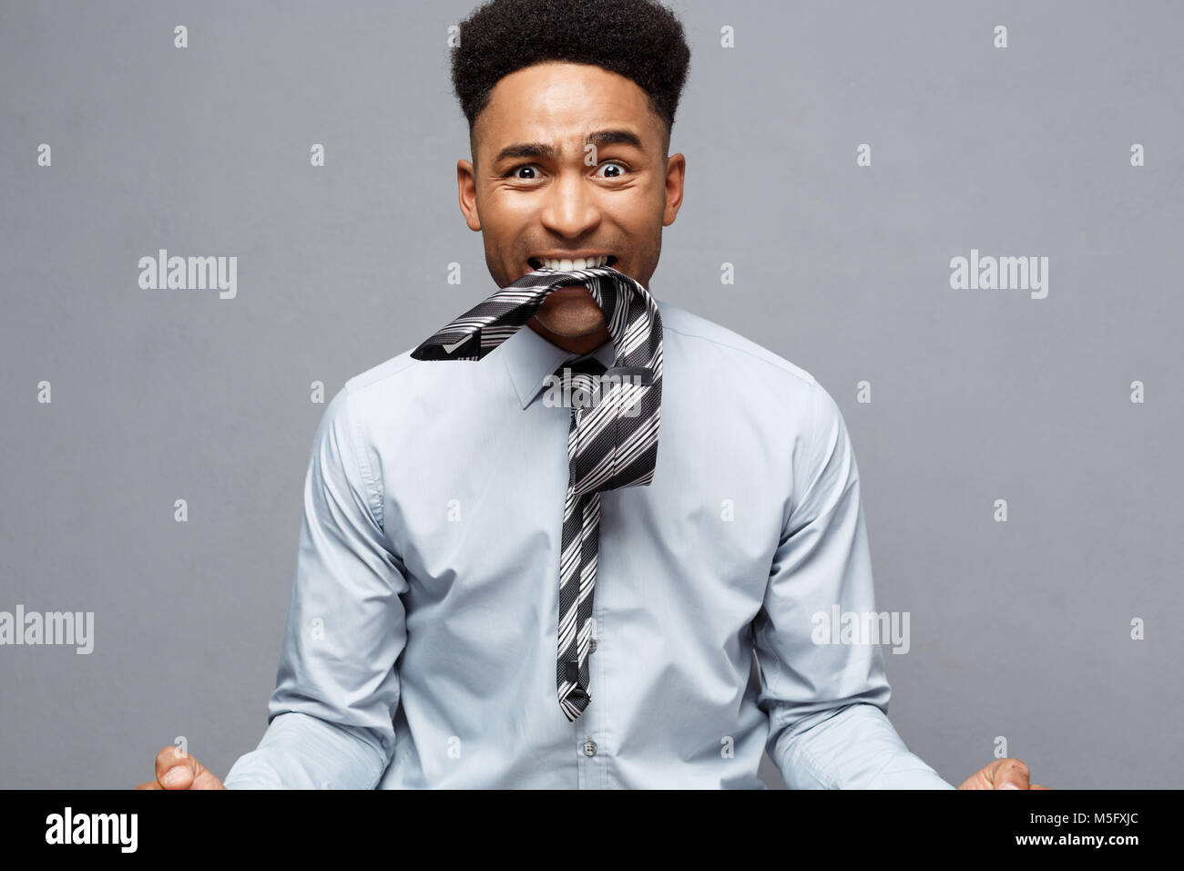 Frustrated african man over black hi-res stock photography and images ...