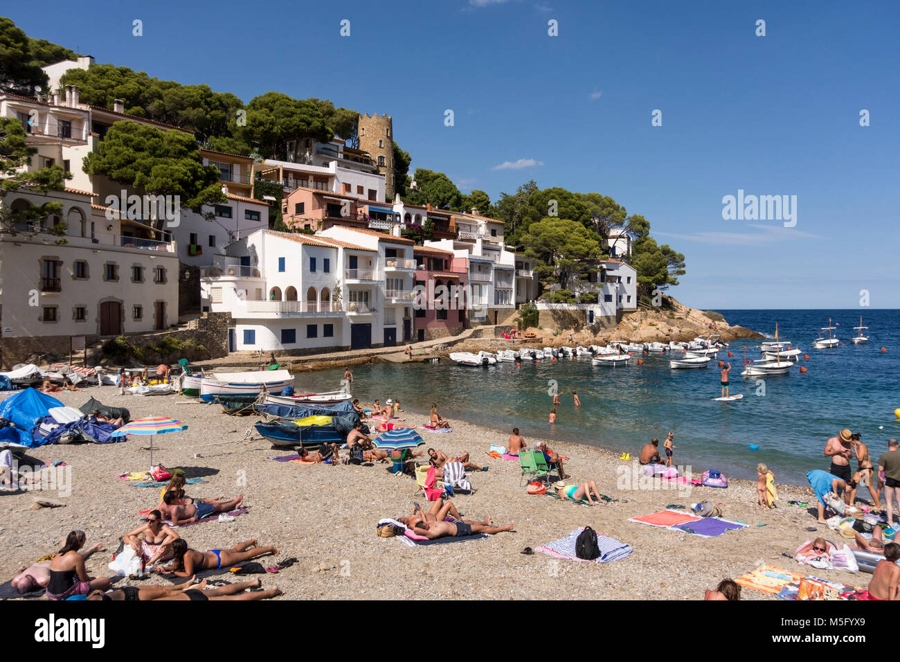 Holidaymakers on the beach at Cove of Sa Tuna, Begur, Baix d'Emporda ...