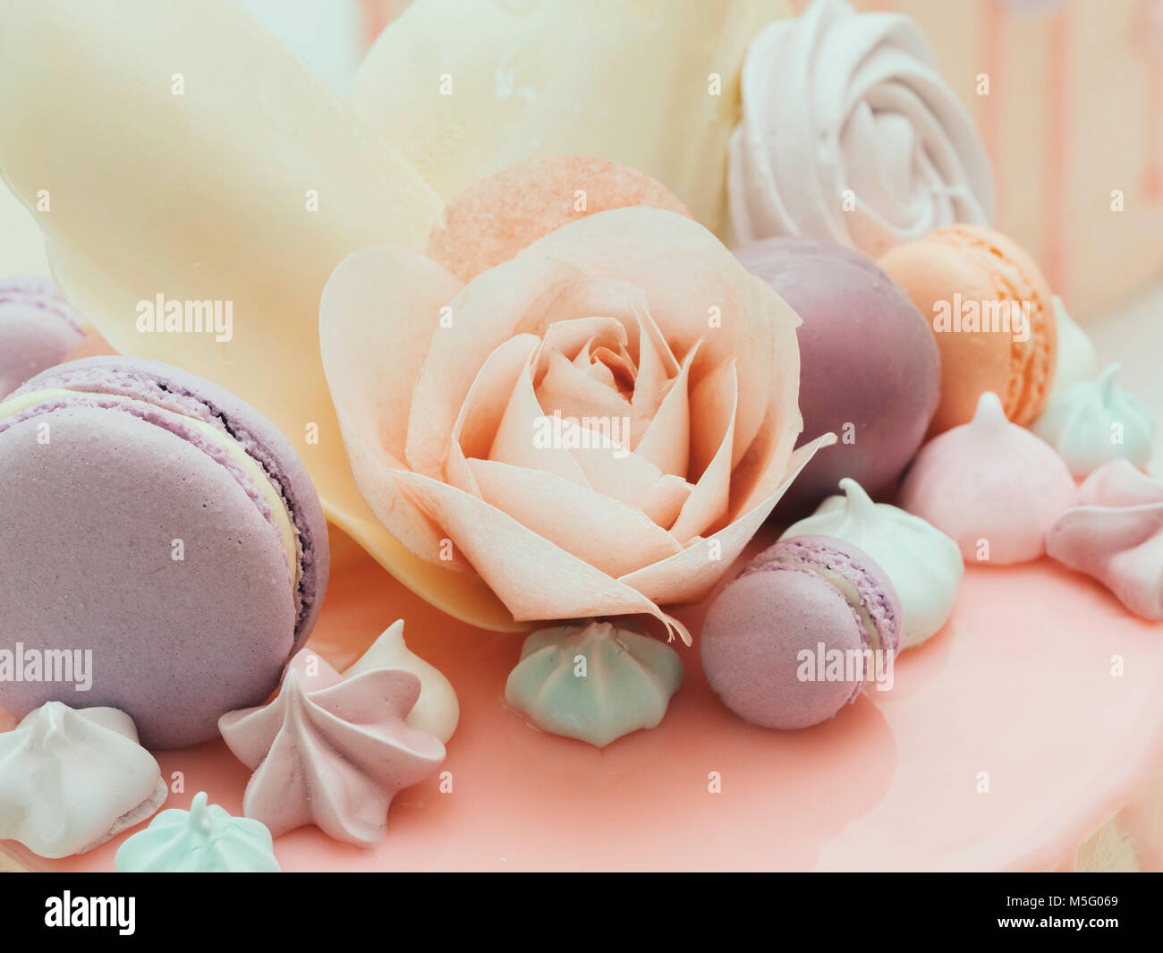 Modern French mousse cake with pink mirror glaze decorated with ...