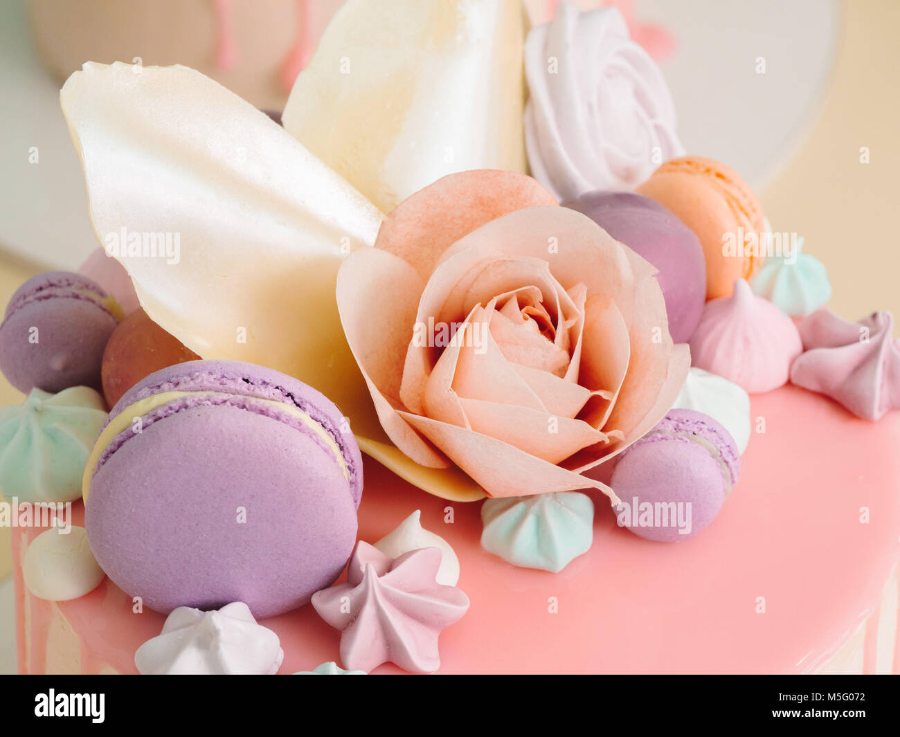 Modern French mousse cake with pink mirror glaze decorated with ...