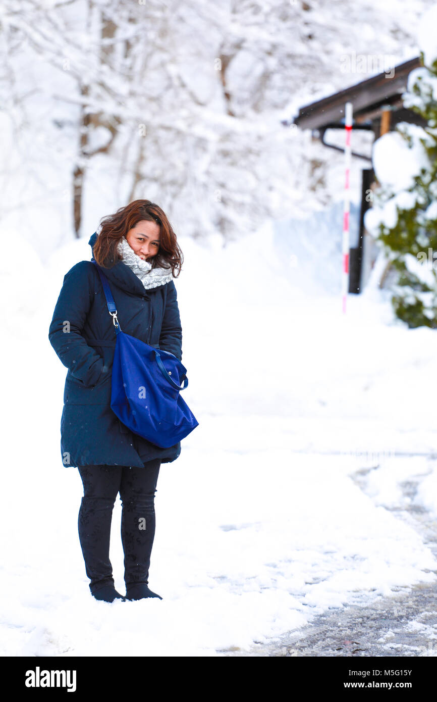 woman on the snow in the winter walk in nature Stock Photo - Alamy