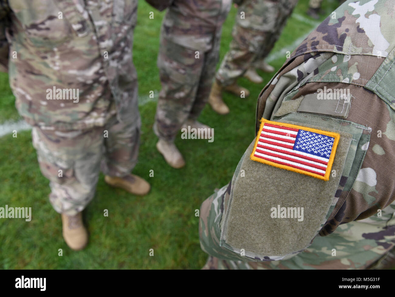 USA patch flag on soldiers arm Stock Photo - Alamy