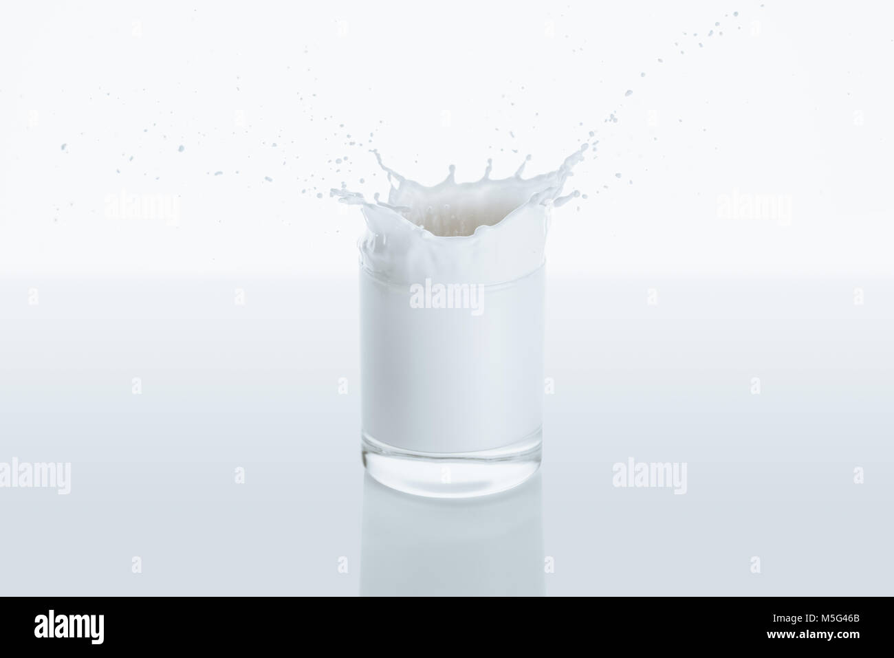 splash of milk in glass Stock Photo - Alamy