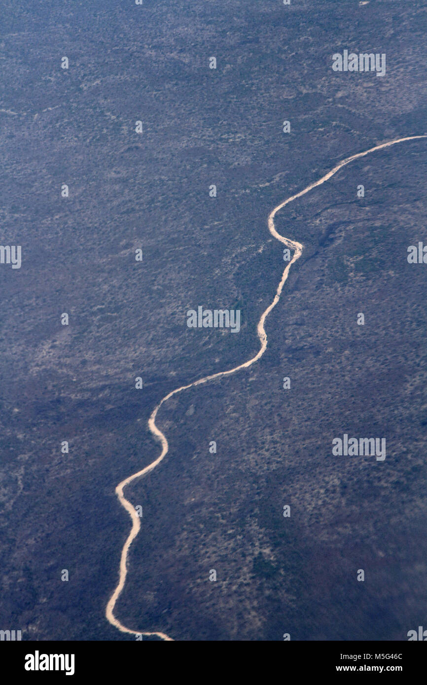 Aerial view of a dry river running inland taken from a plane, Coastline ...