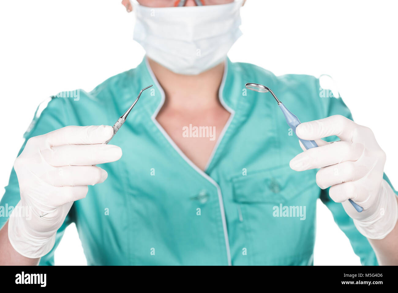professional dentist with tools Stock Photo - Alamy