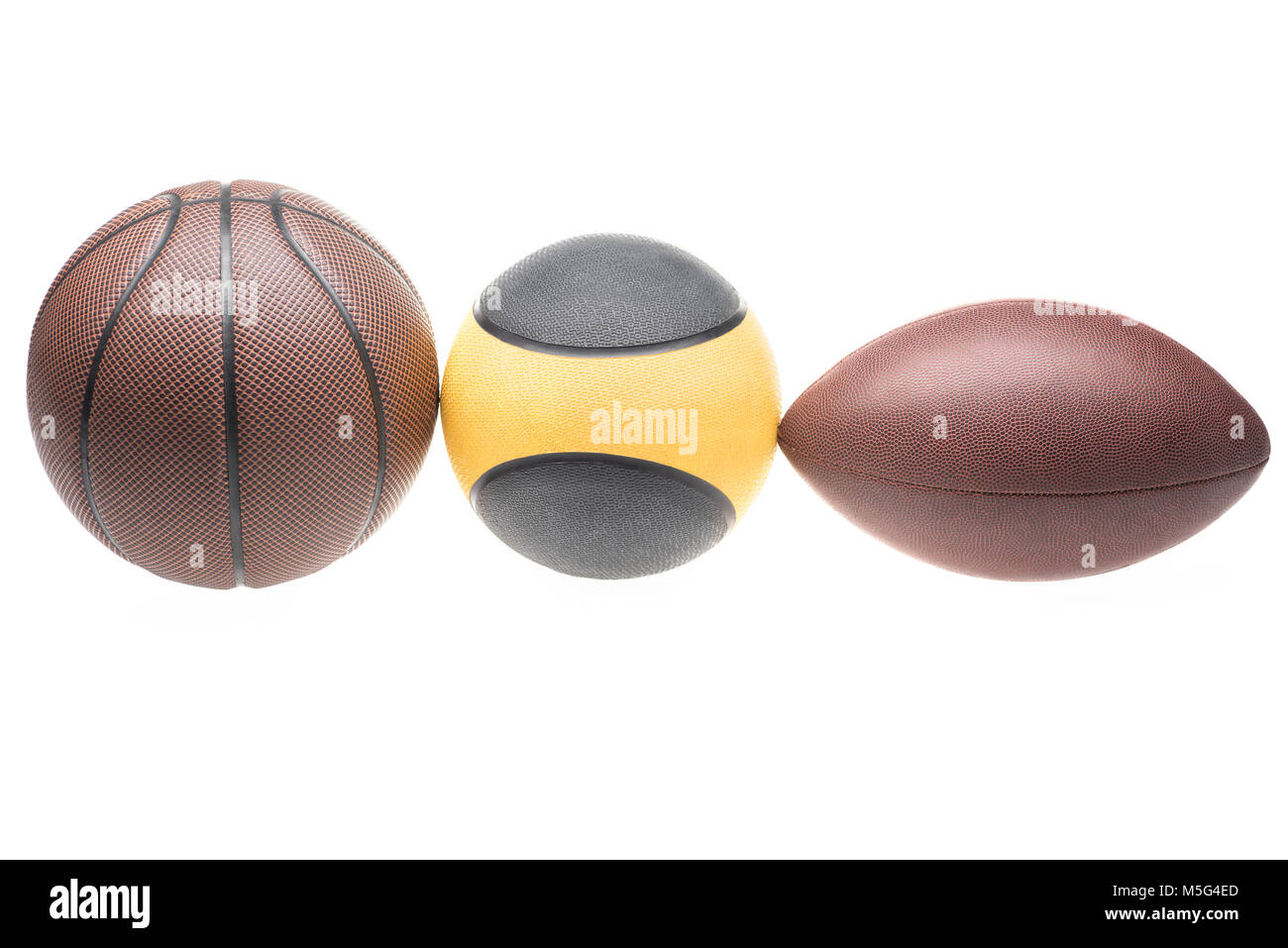 sport balls in a row Stock Photo - Alamy