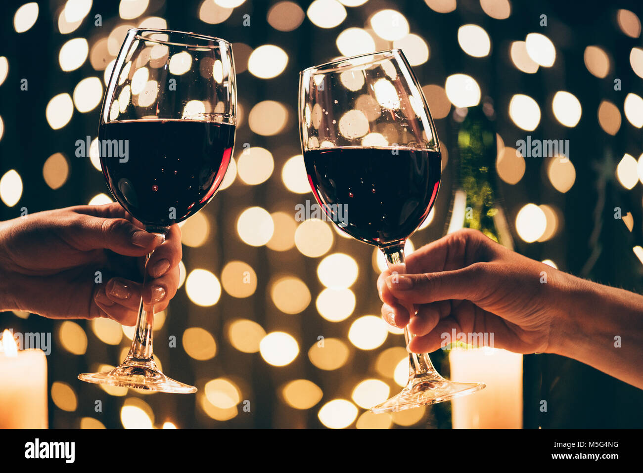 women clinking glasses with wine Stock Photo - Alamy