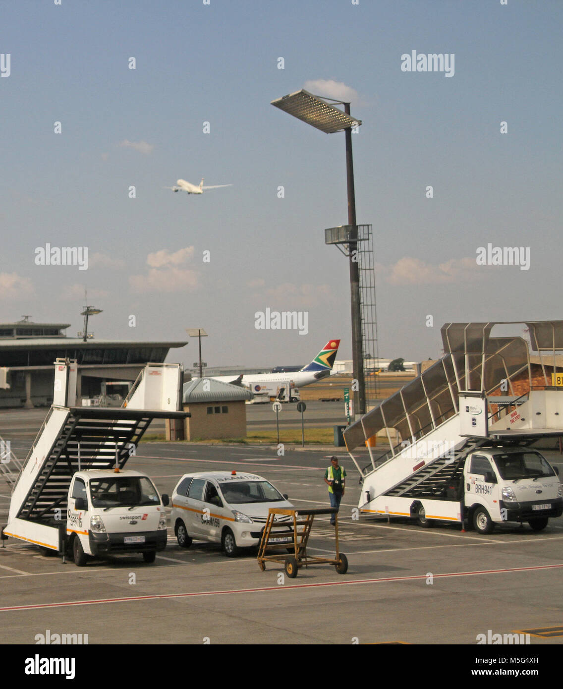 Passenger boarding steps/ramps at O.R. Tambo International Airport ...