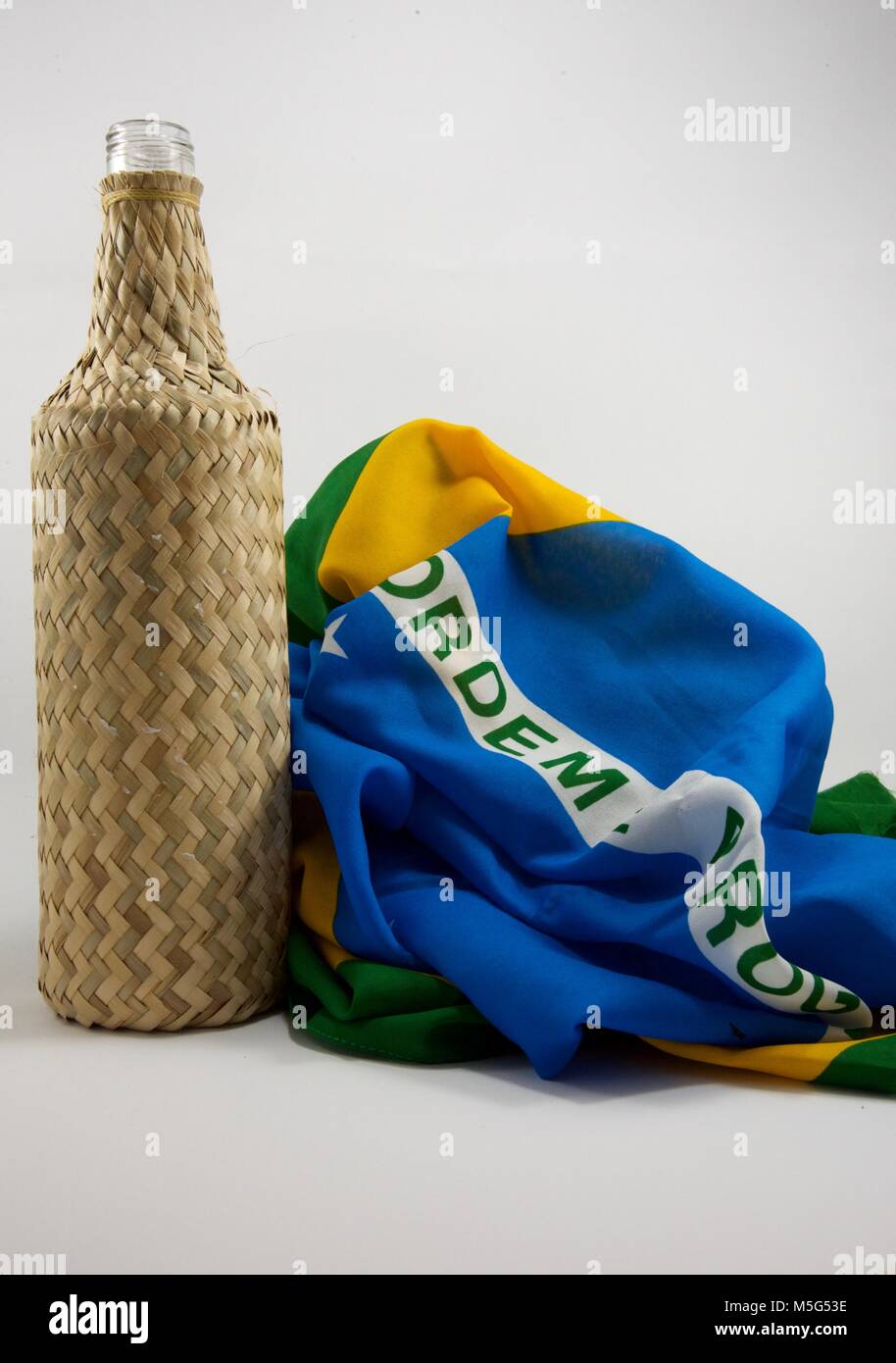 Cachaça bottle Brazilian liquor and flag Stock Photo - Alamy