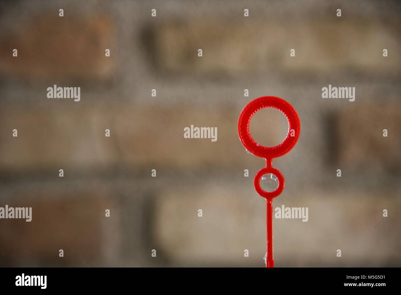 Soap bubble red stick Stock Photo - Alamy