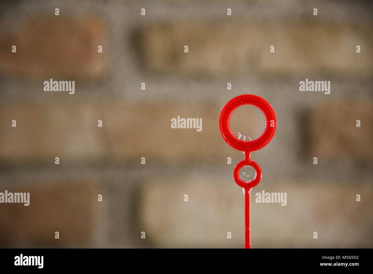 Soap bubble red stick Stock Photo - Alamy