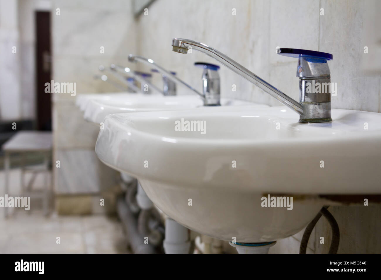 Several washbasin in public hospital Stock Photo - Alamy