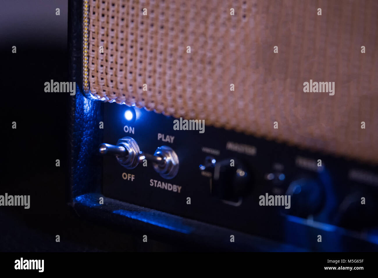 Guitar amplifier control panel, on-off Stock Photo - Alamy