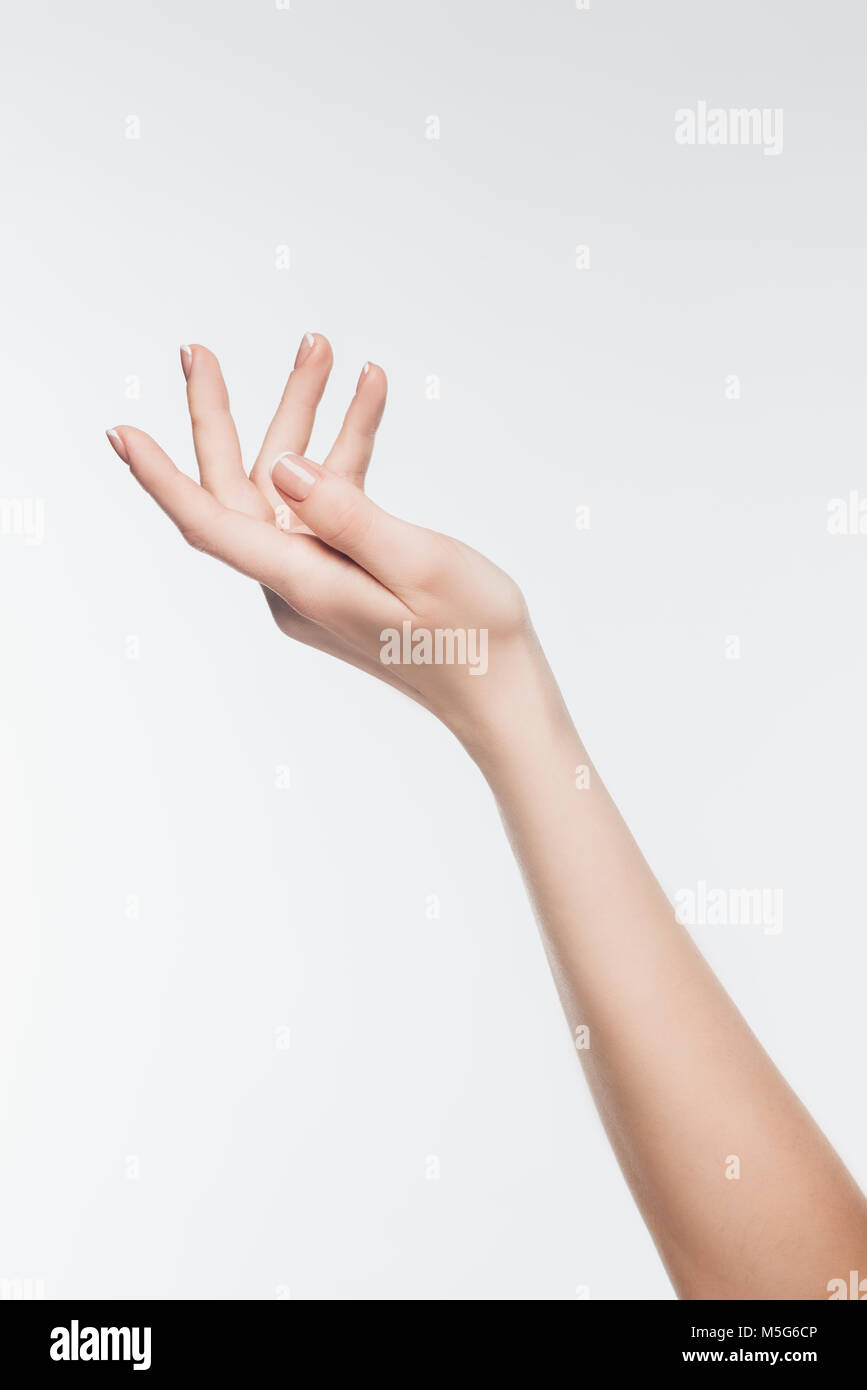 cropped shot of female hand with perfect skin isolated on white Stock ...