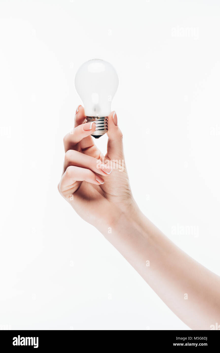 cropped shot of woman holding light bulb isolated on white Stock Photo ...
