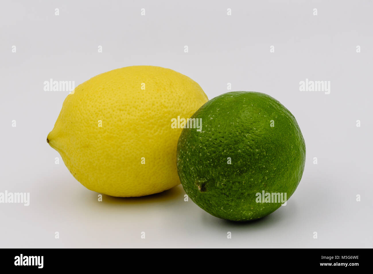 Isolated lemon and lime Stock Photo - Alamy