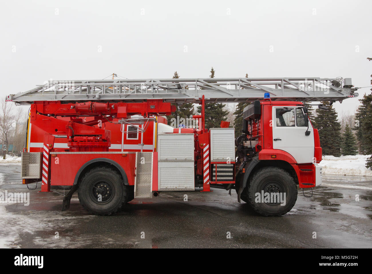 Fire truck with ladders and hoses - big red Russian fire fighting ...