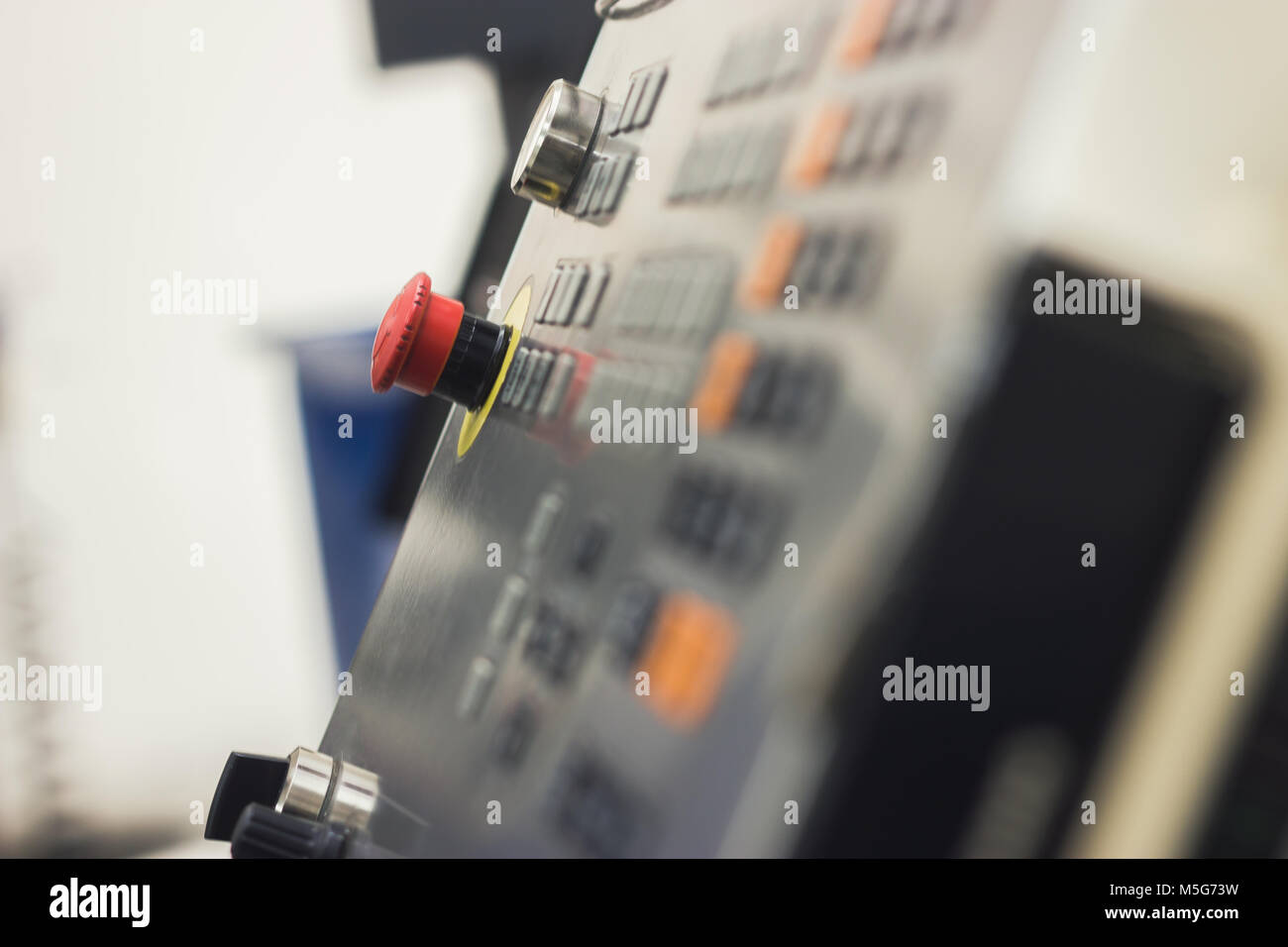 Red button of control panel machine processing metal, industrial ...