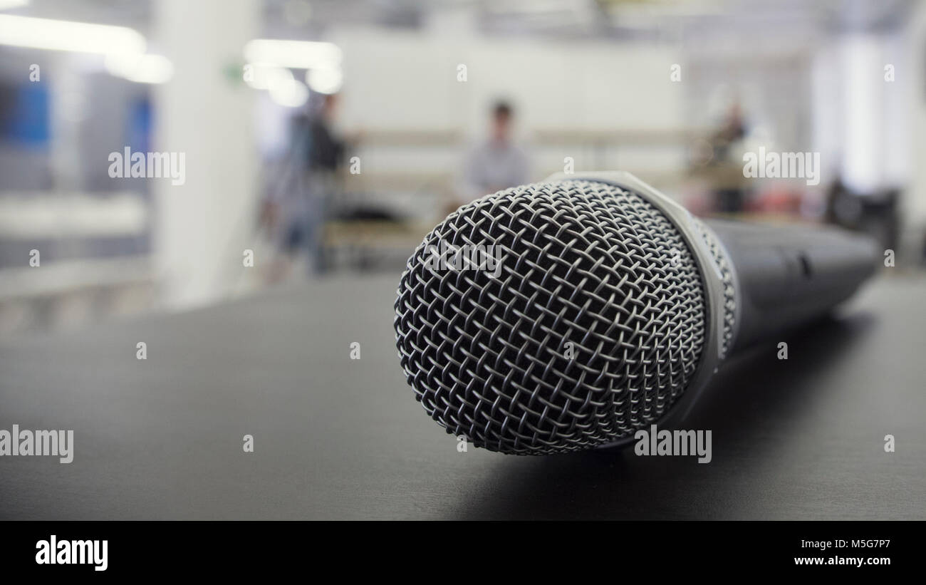 Dynamic vocal microphone on stage Stock Photo - Alamy