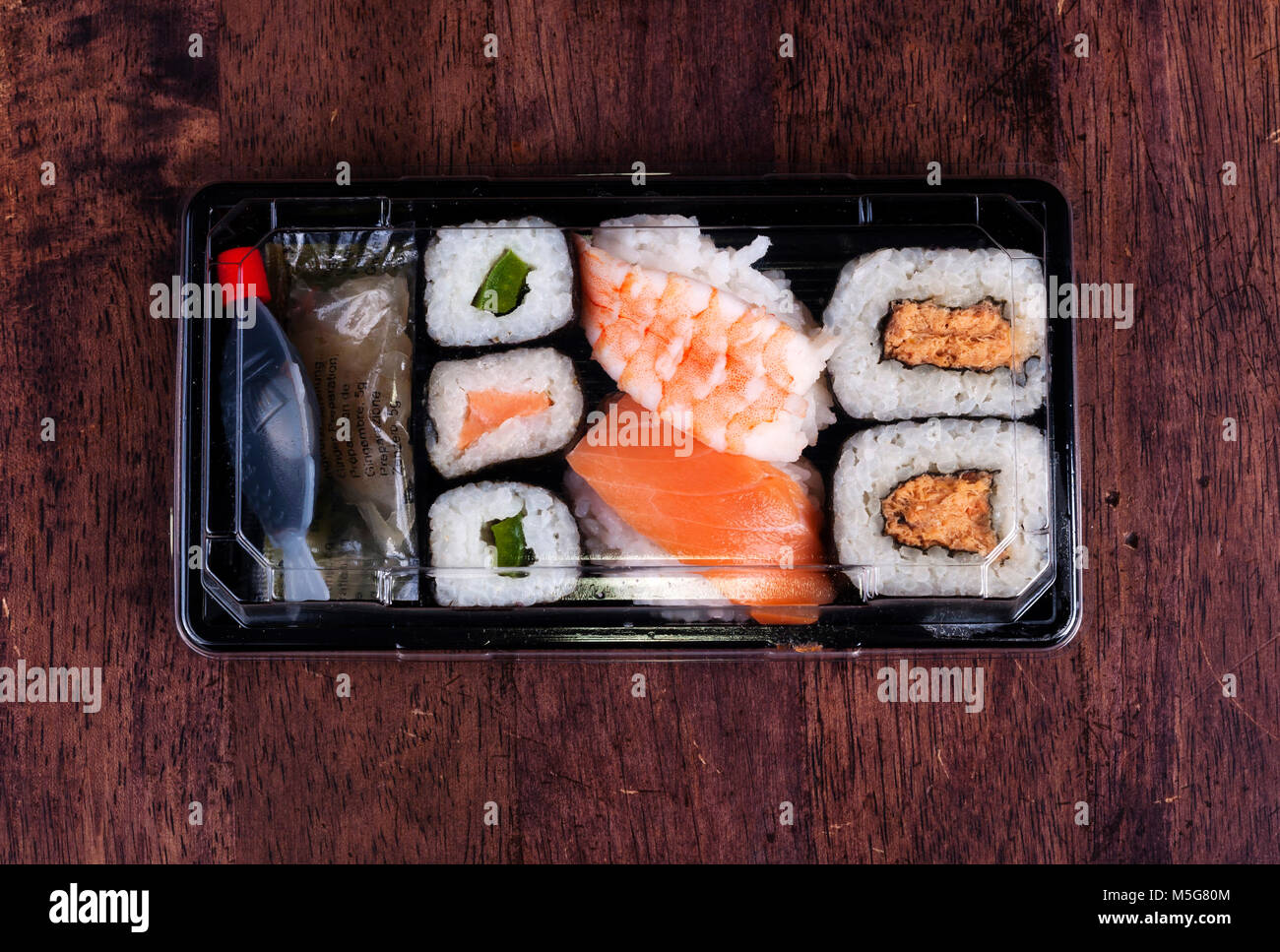 sushi box or bento box with assorted sushi pieces Stock Photo - Alamy