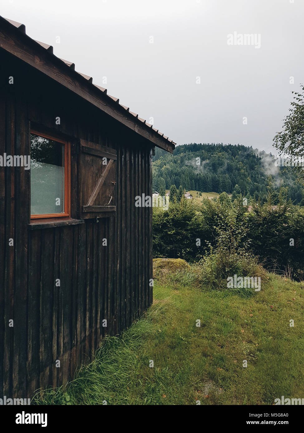Wooden cabin in the Vosges mountains in France. Cold and cloudy Stock ...
