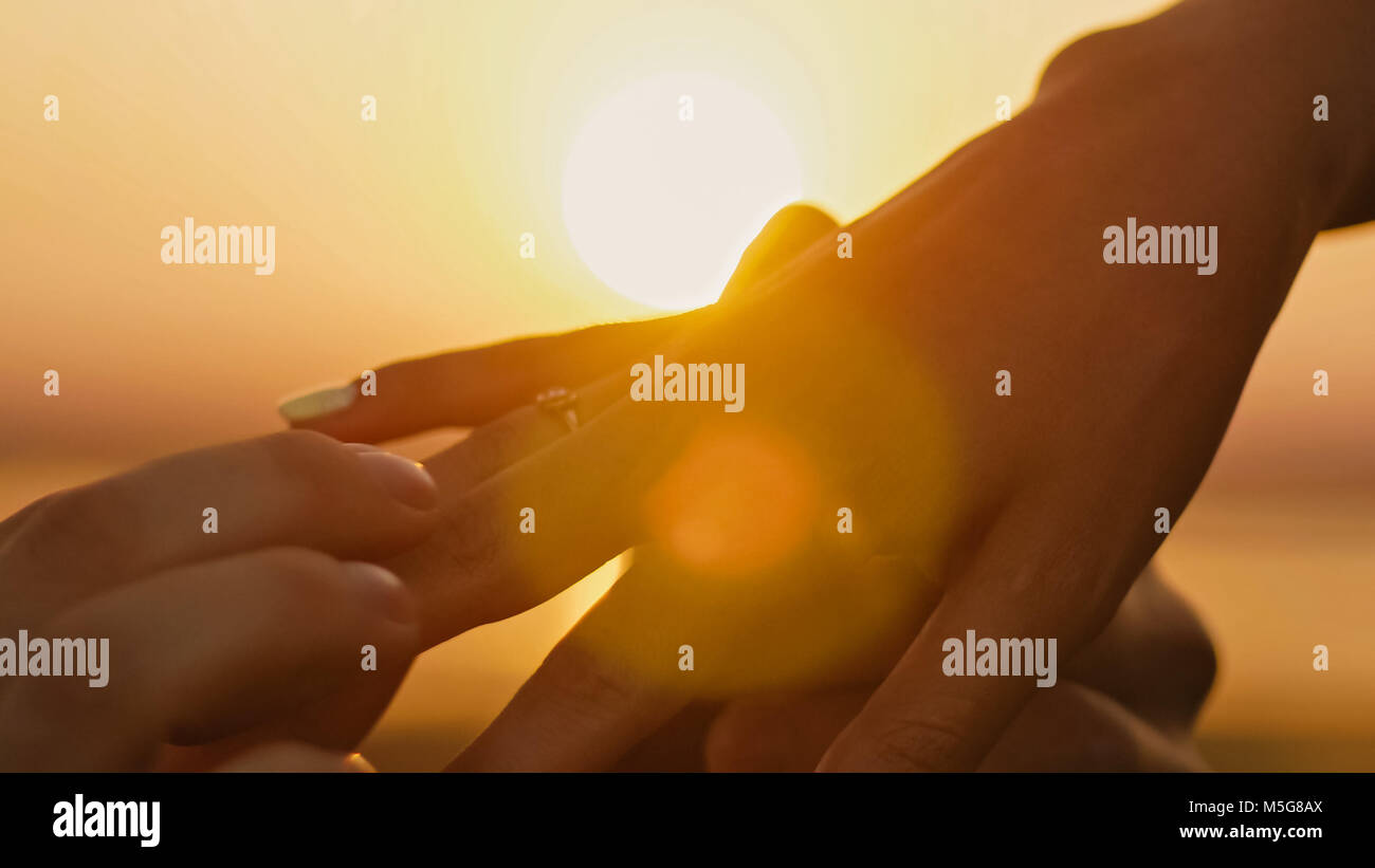 Wedding Ring Put On Finger Hands Touching Sunset Bride Groom Man Woman ...