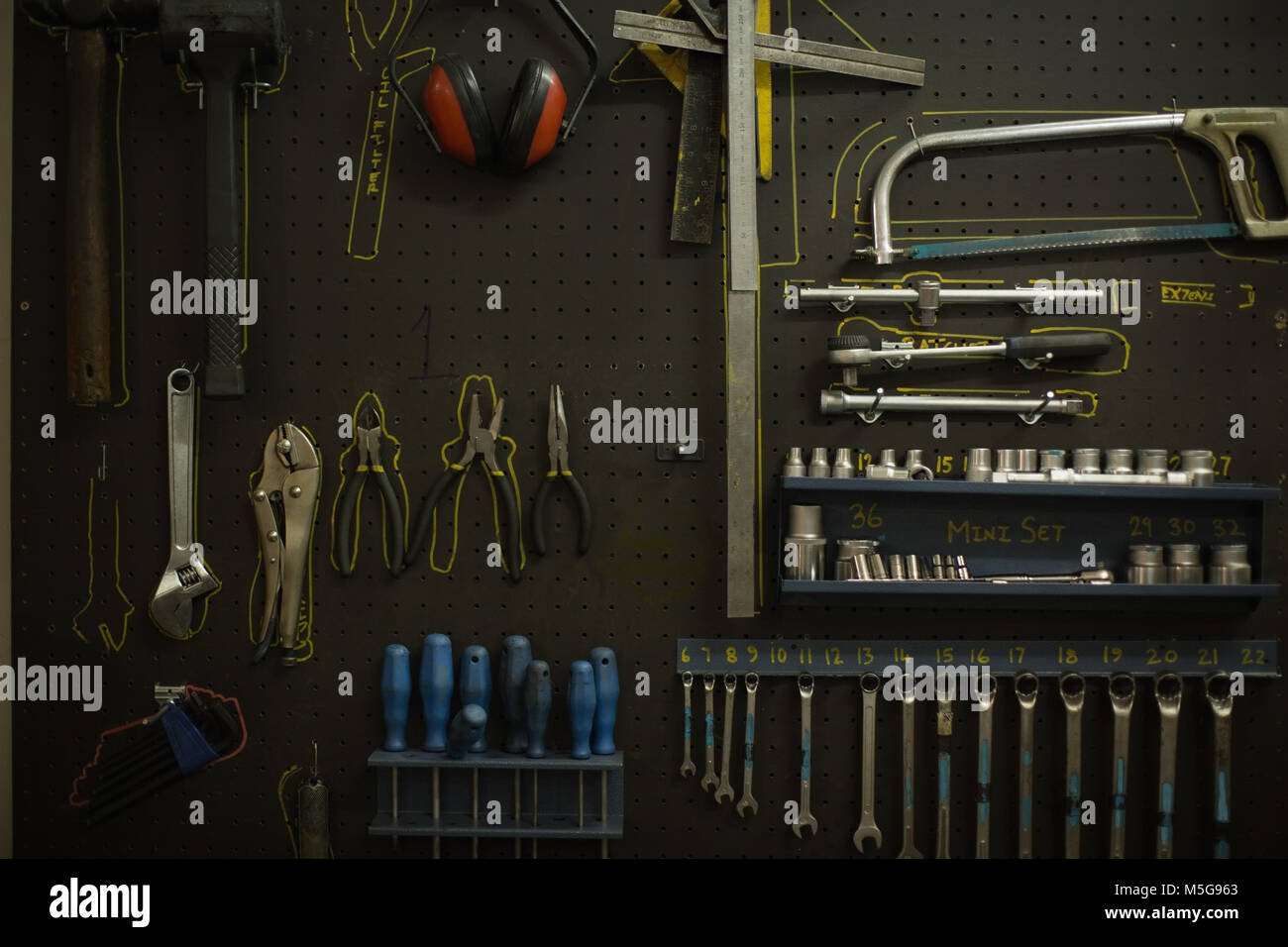 Various tools in garage Stock Photo - Alamy