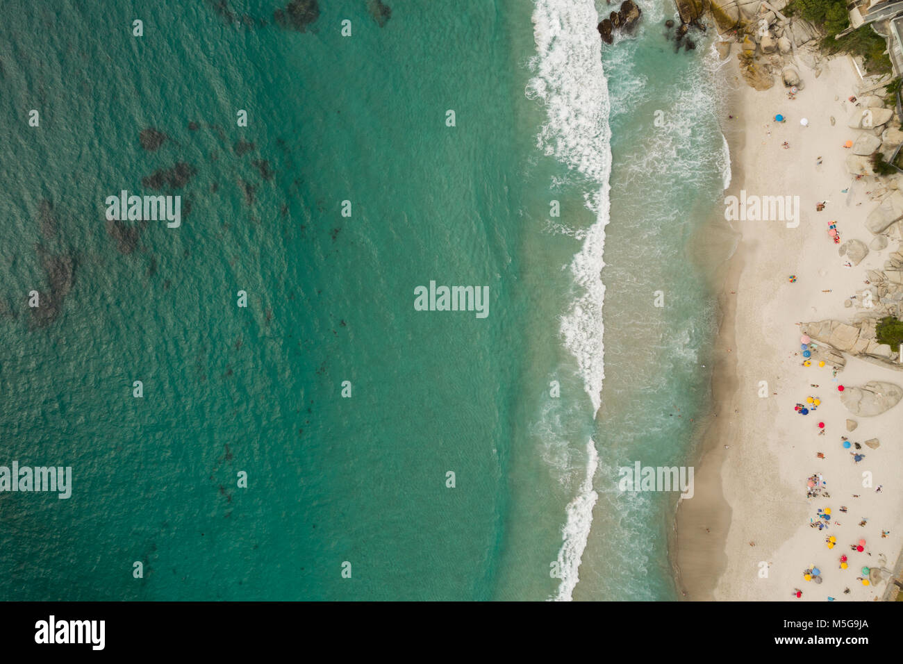 Tourist sunbathing at beach on a sunny day Stock Photo - Alamy