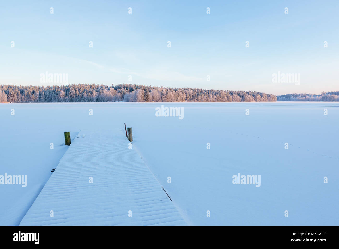 Winter lake scenery in finland Stock Photo - Alamy