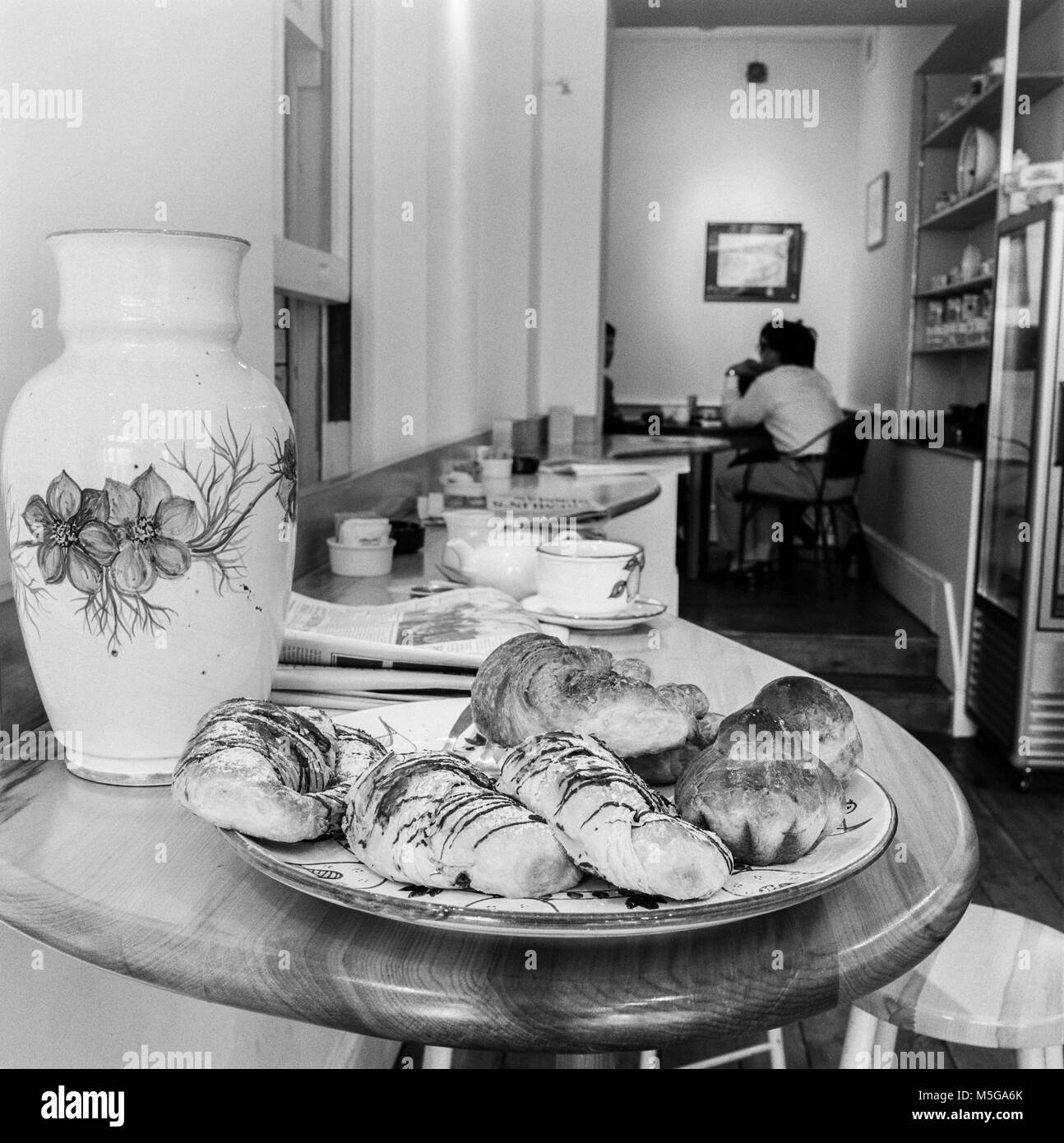 Pastry on table Black and White Stock Photos & Images - Alamy