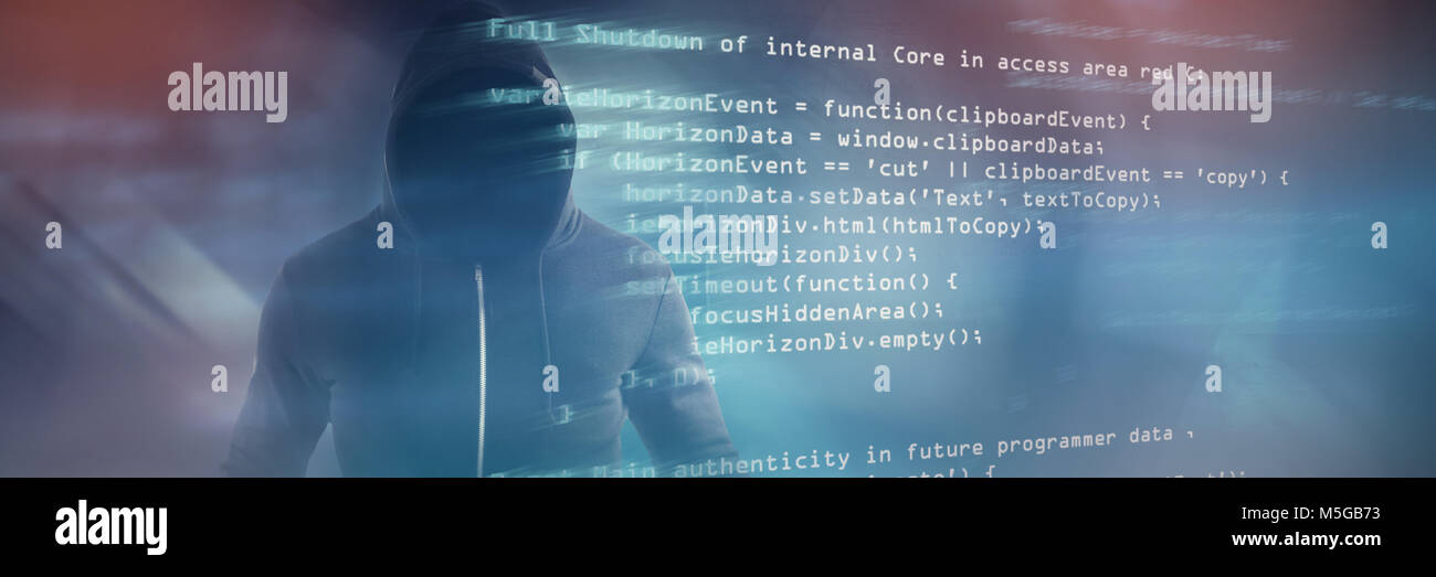 Composite image of male hacker standing Stock Photo - Alamy