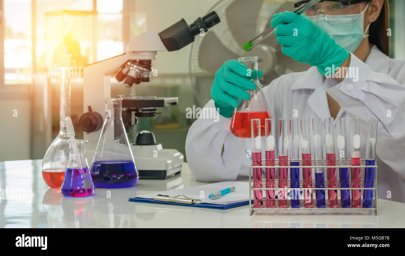 scientist with equipment and science experiments in laboratory Stock ...