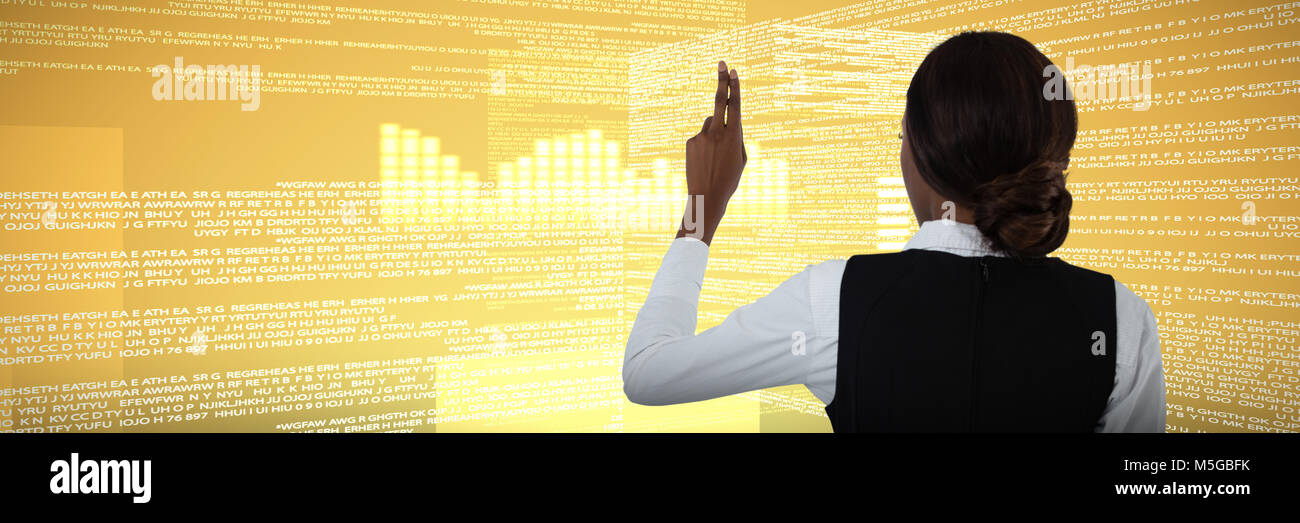 Composite image of rear view of businesswoman using invisible interface ...