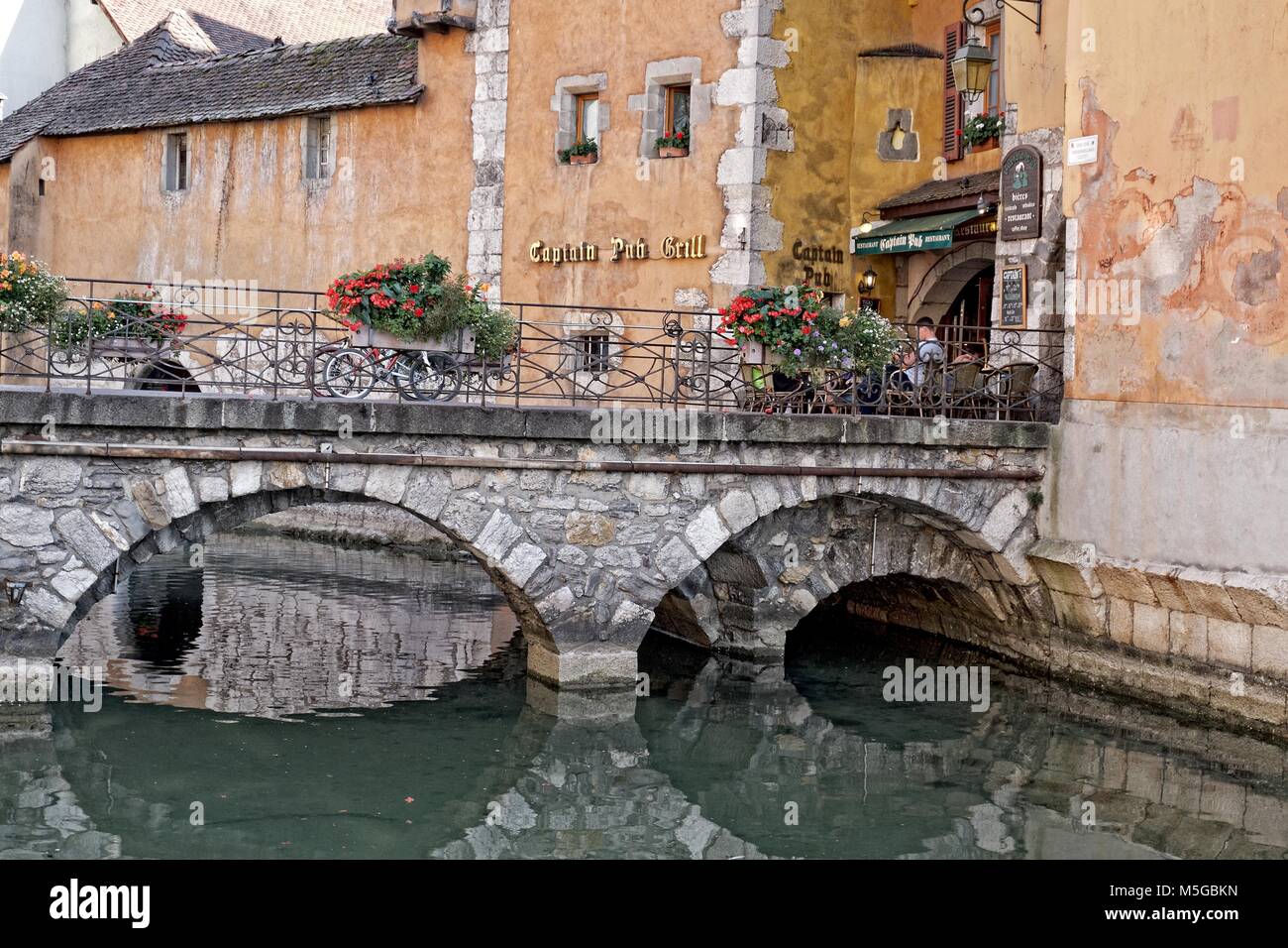 Annecy, France, old town with a stone bridge over the river Stock Photo ...