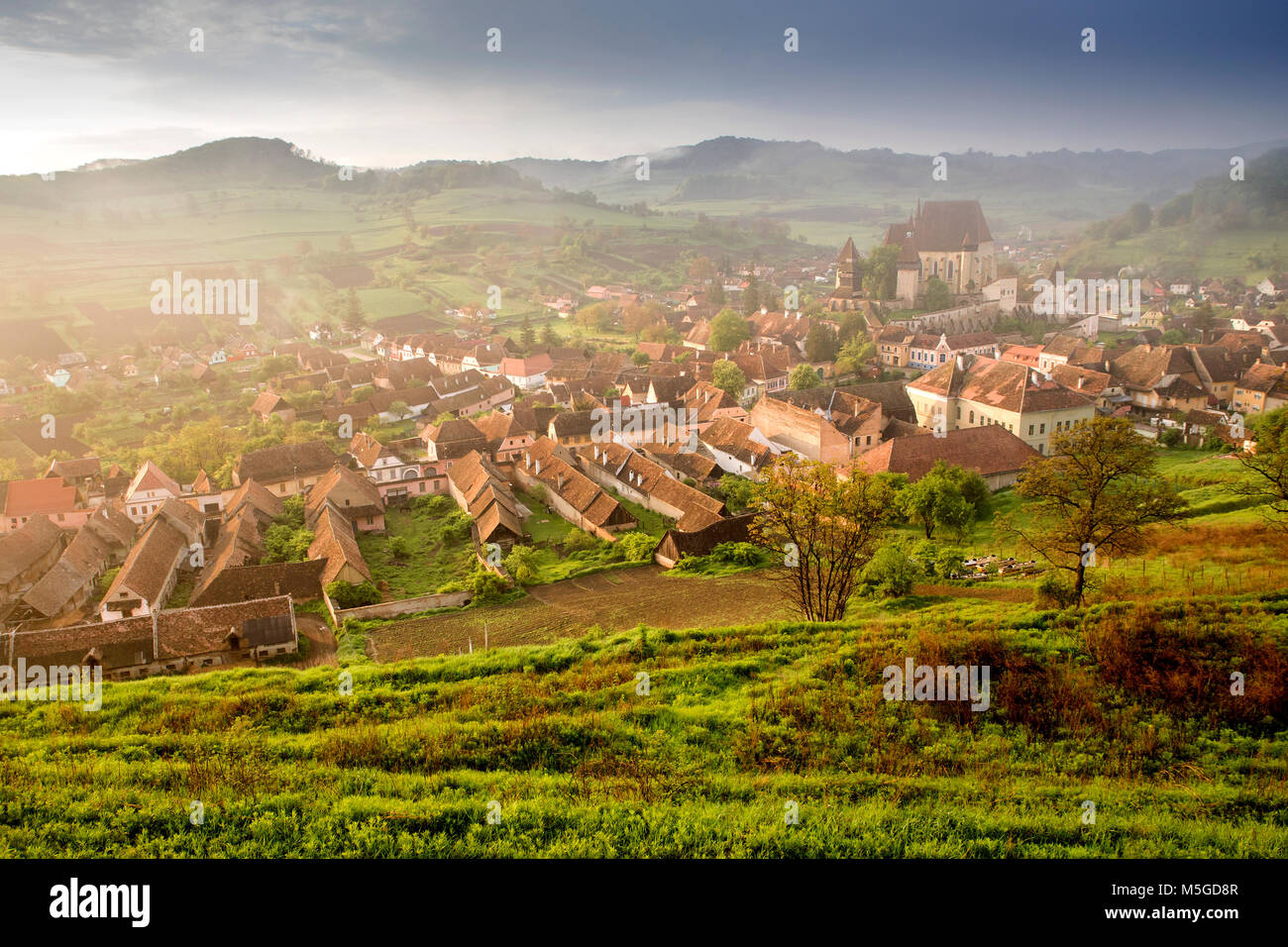 Biertan fortified church at sunrise. Romanian village from Transylvania ...