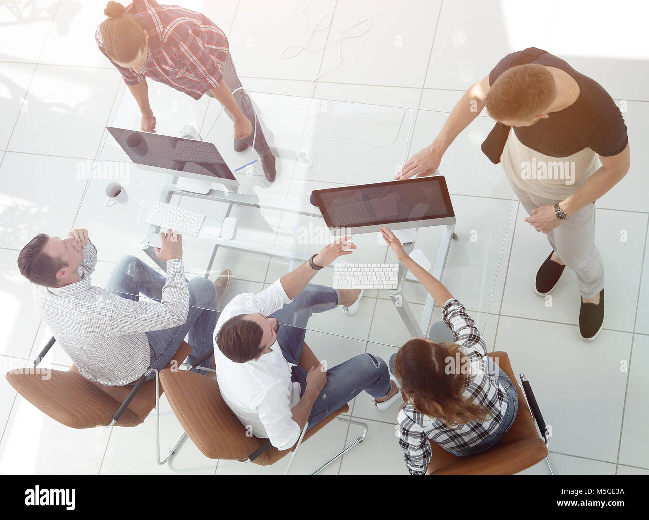 Top view creative team works in the office Stock Photo - Alamy