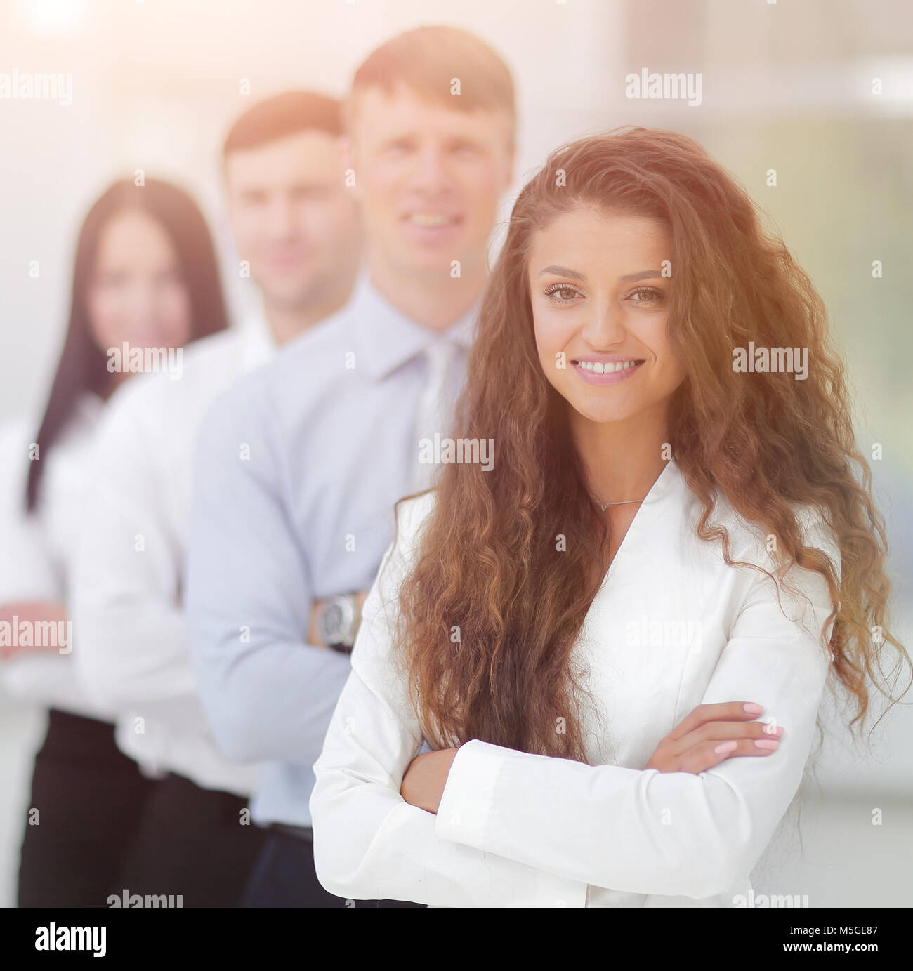 woman leader at the head of the business team Stock Photo - Alamy