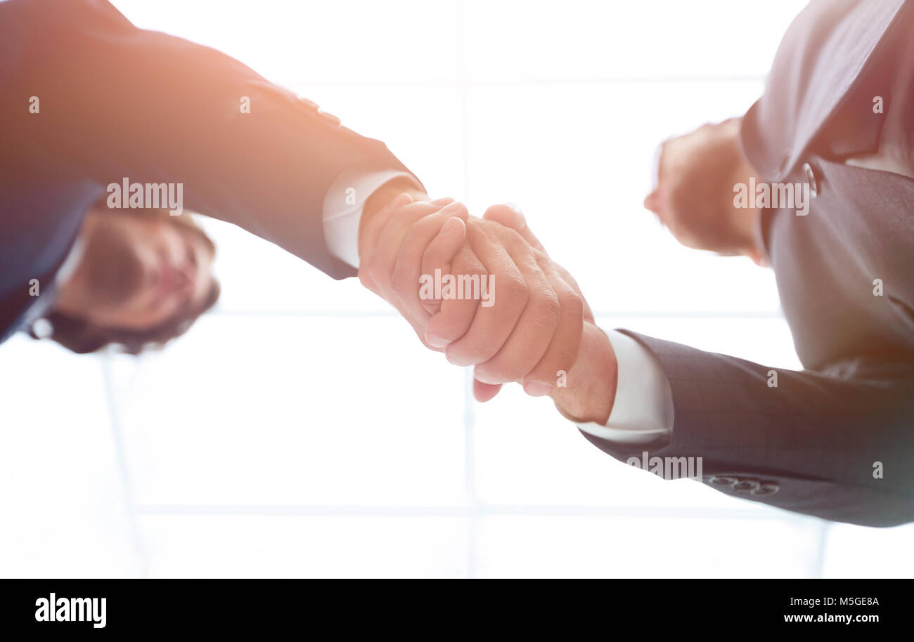 Two business people are holding hands to business cooperation Stock ...