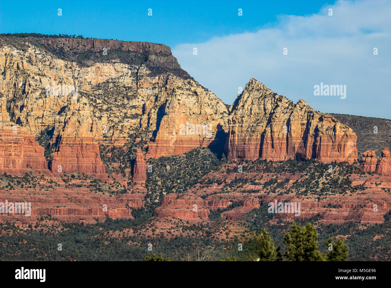 Sheer Red Rock Cliffs With Geological Layers & Outcroppings Stock Photo ...