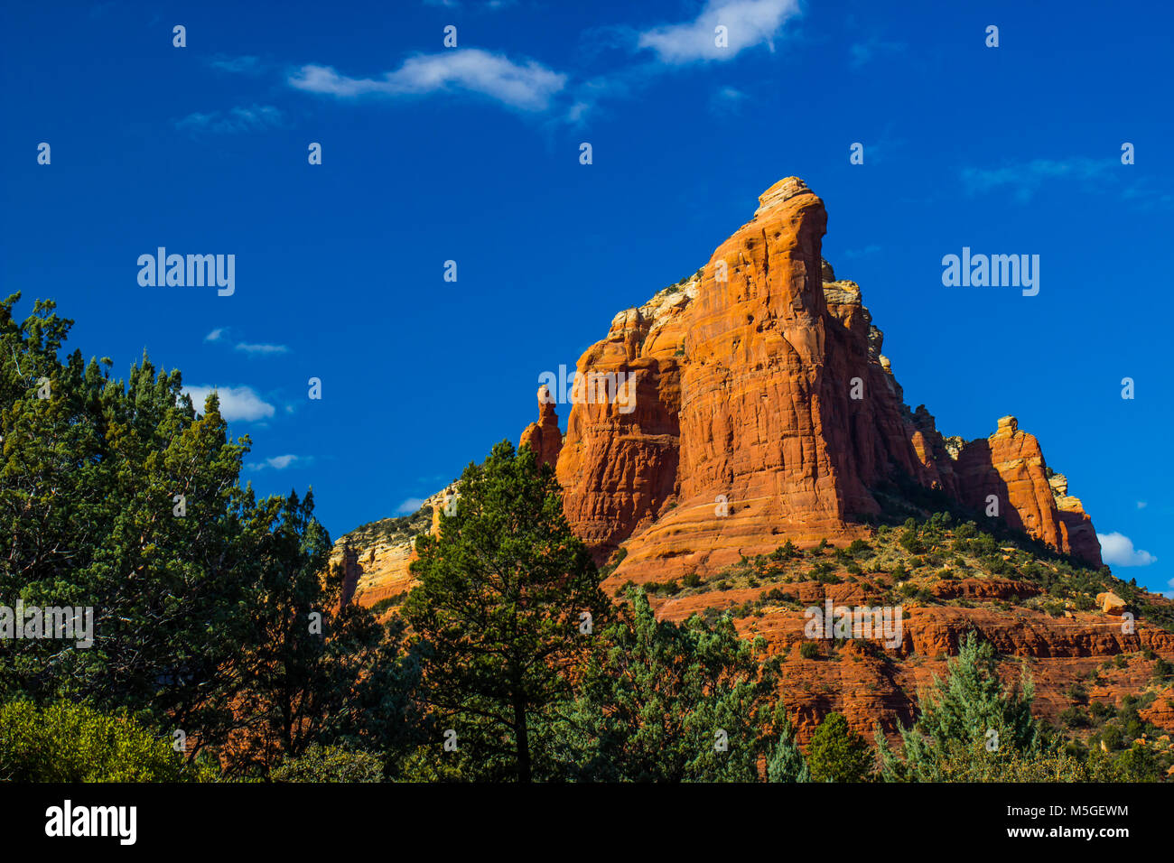 Red Rock Cliff On Mountain With Geological Layers Stock Photo - Alamy