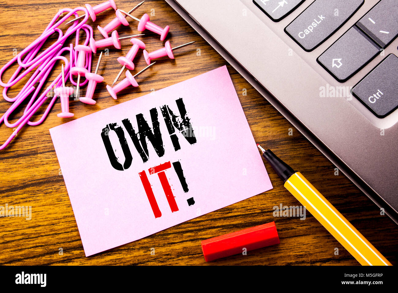 Handwritten text showing Own It Exclamation. Business concept for ...