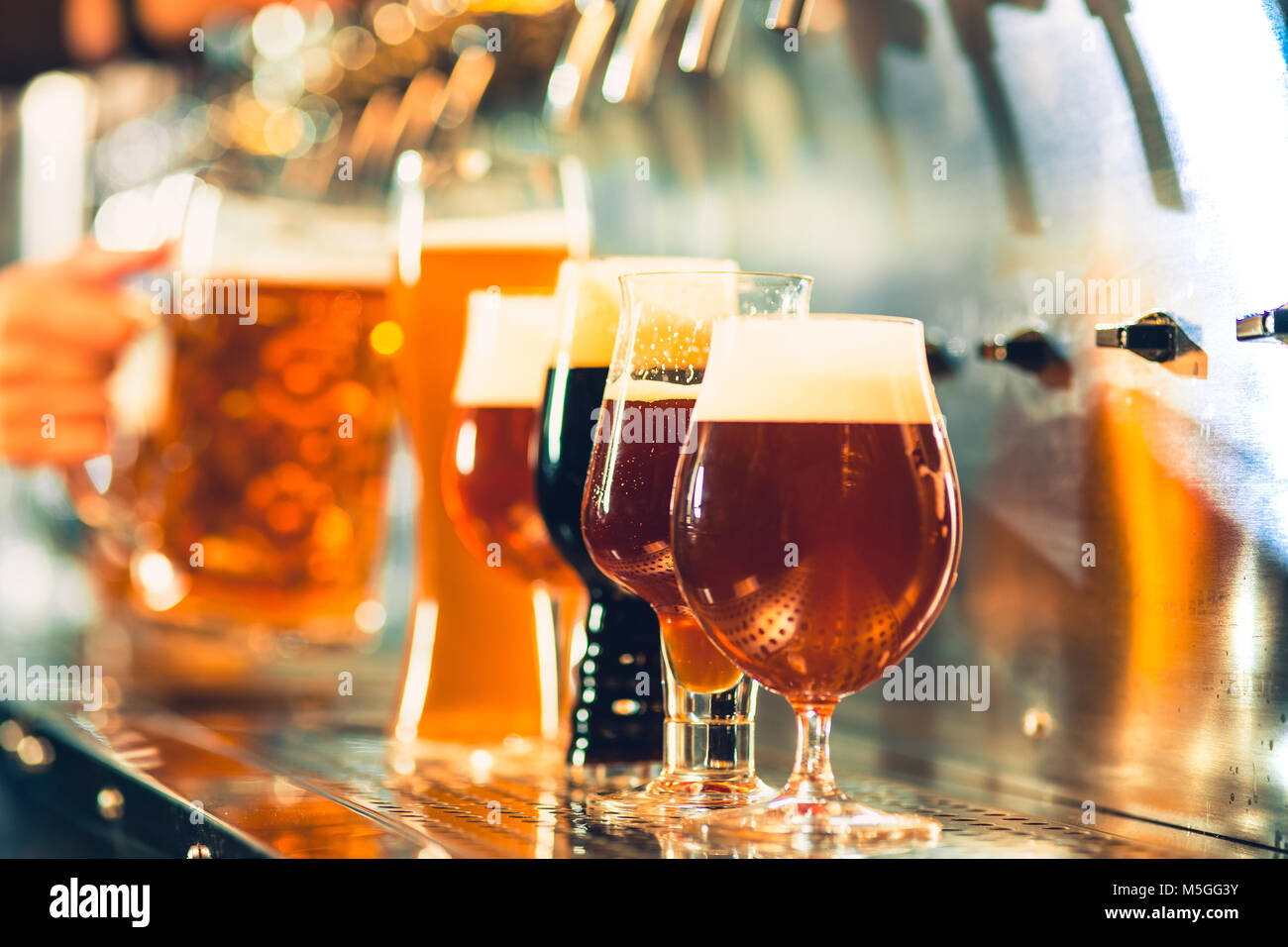 Beer taps in a pub Stock Photo - Alamy