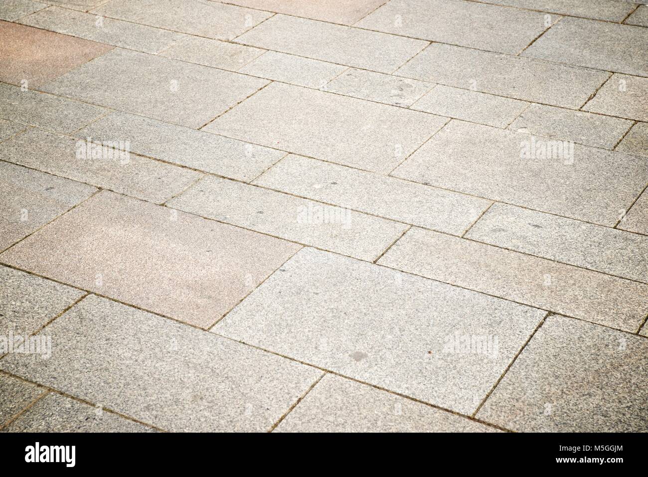 Floor of a street with stone tiles Stock Photo - Alamy