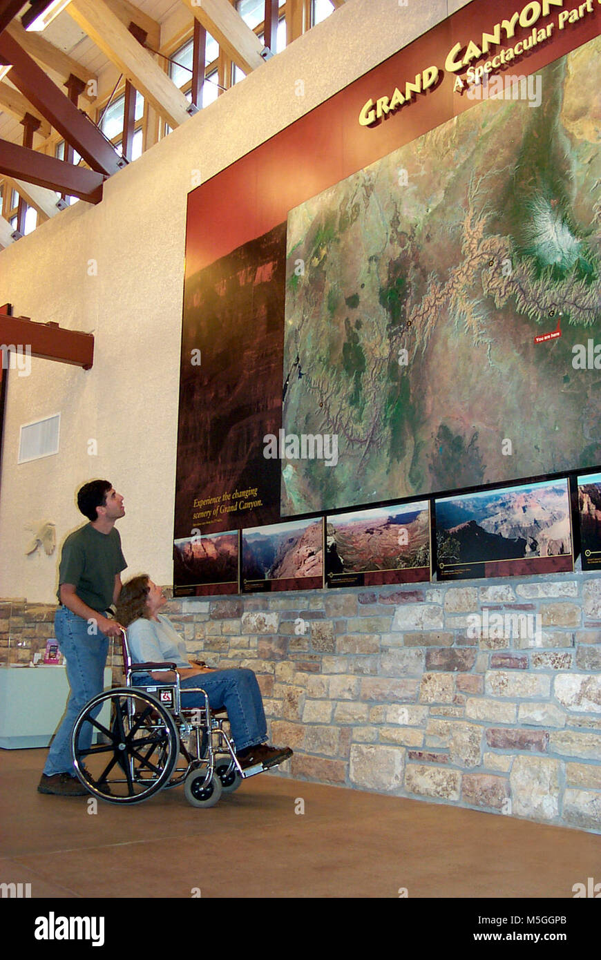 Grand Canyon Visitor Center (circa ) Dacc VISITORS VIEWING A MAP OF ...