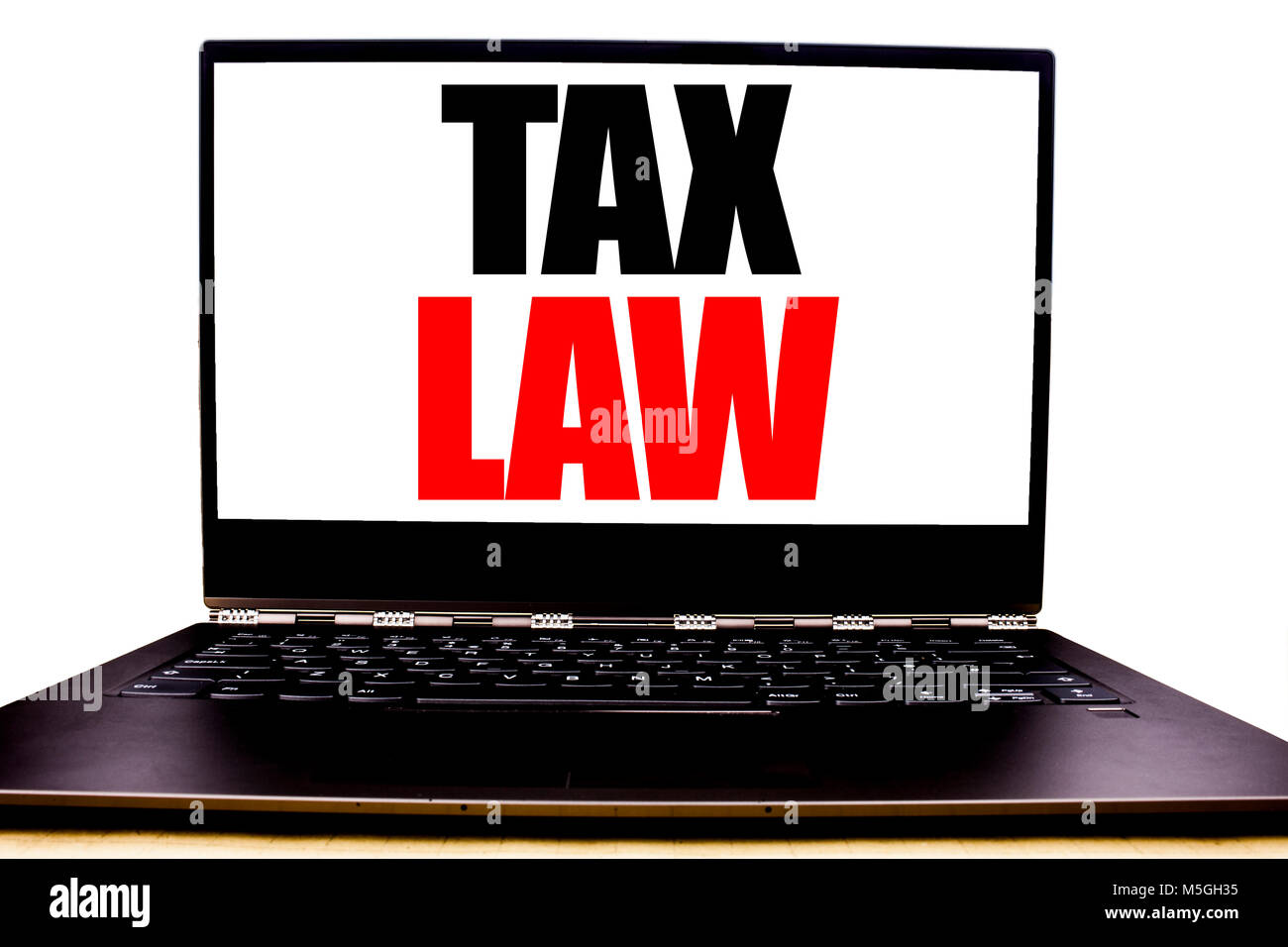 Handwritten text showing Tax Law. Business concept writing for Taxation ...